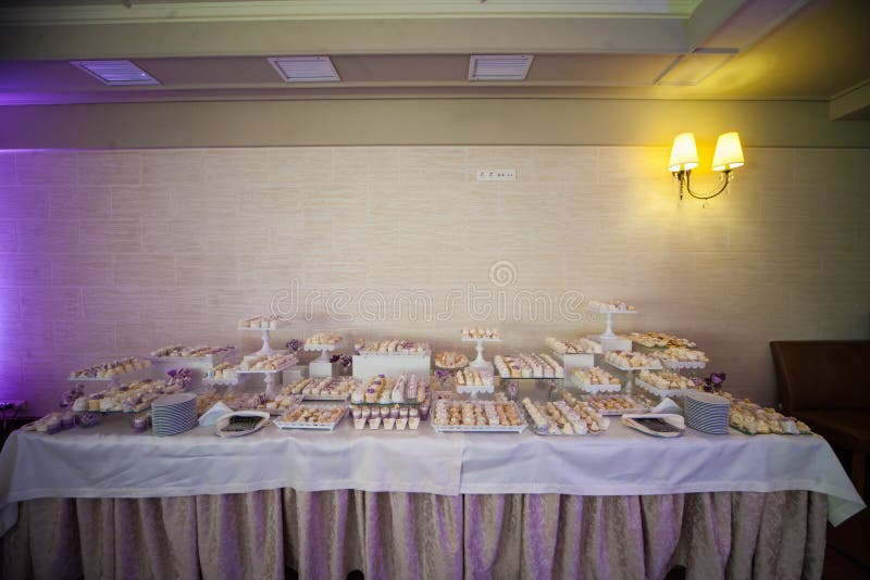 Delicious, Beautiful White Dessert Table at Wedding Reception Stock ...