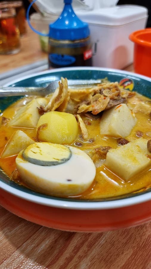 Delicious Beef Curry with Rice Cake Stock Image - Image of local ...