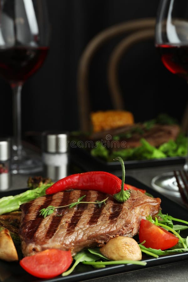 Delicious Beef Steak Served on Table, Closeup Stock Photo - Image of ...