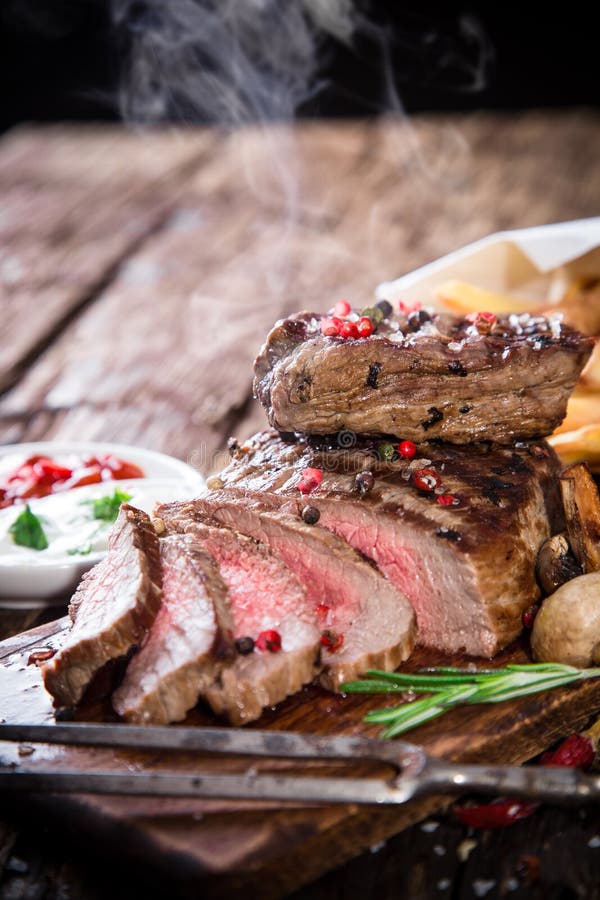 Delicious beef steak stock photo. Image of green, grill - 40384784