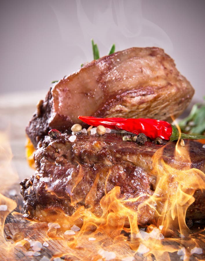 Delicious beef steaks stock photo. Image of charbroiled - 30793974