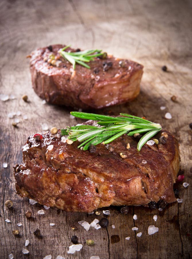 Delicious beef steaks stock photo. Image of meat, flame - 31345078