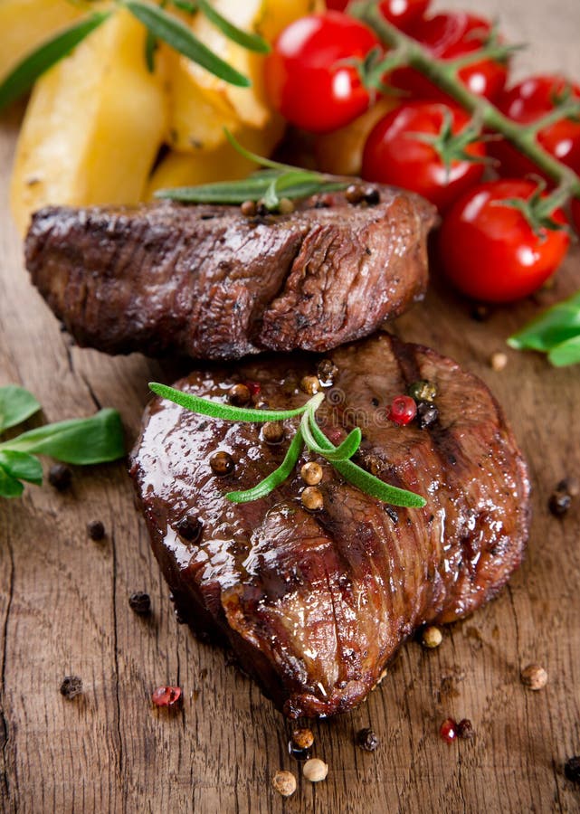 Delicious beef steaks stock photo. Image of fire, product - 32294678