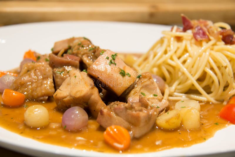 Delicious Beef Stew with Spaghetti on Plate Stock Image - Image of stew ...