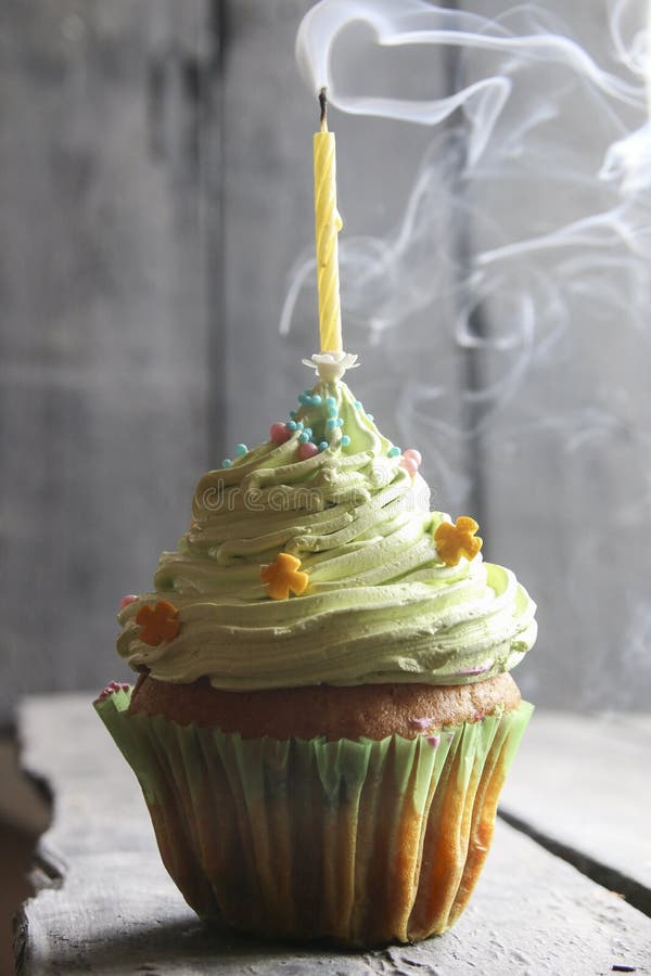 Delicious Birthday Cake with One Candle, Floating Smoke Stock Photo ...