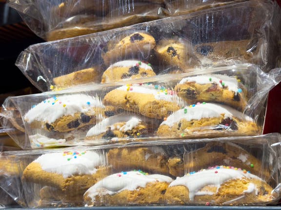Delicious Biscotti with Icing and Sprinkles in Clear Packaging Display ...