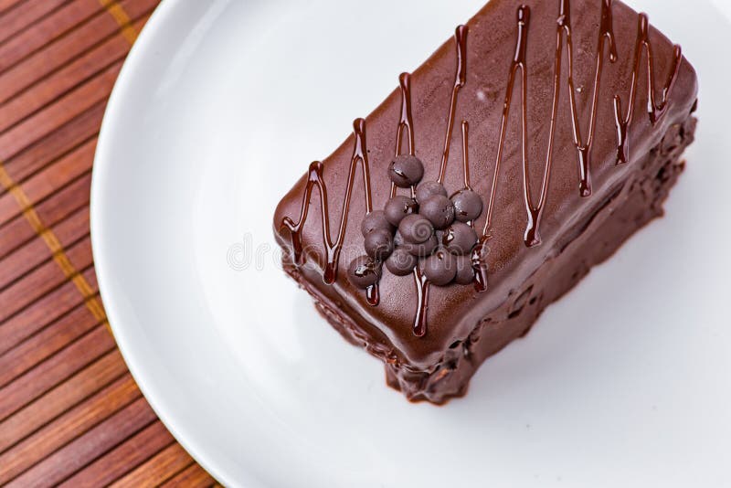 Chocolate cake on plate stock image. Image of garnish - 125733149