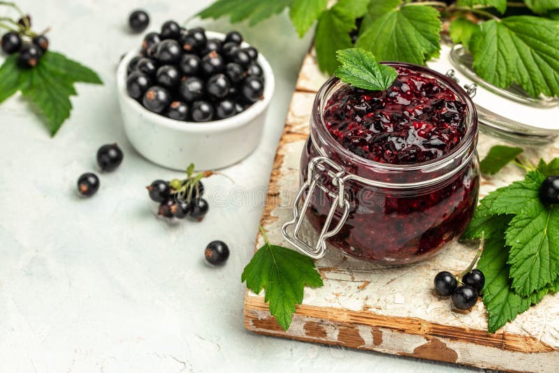 Black Currant Jam Curd, Custard or Jam in Jar. Place for Text, Top View ...