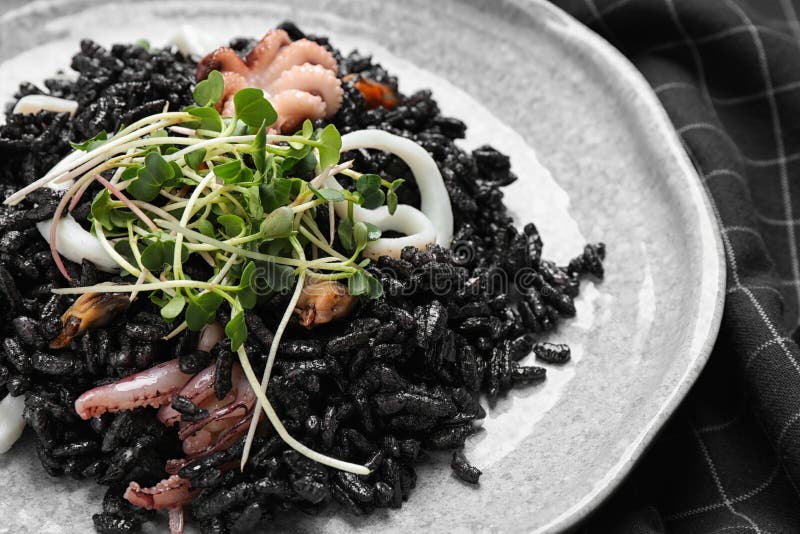 Delicious Black Risotto with Seafood in Plate Stock Photo - Image of ...