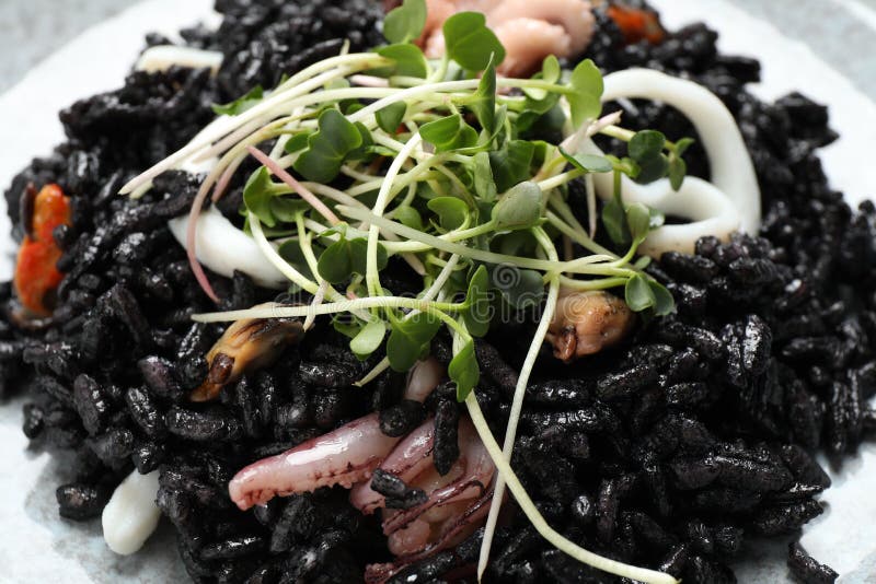 Delicious Black Risotto with Seafood in Plate, Closeup Stock Photo ...