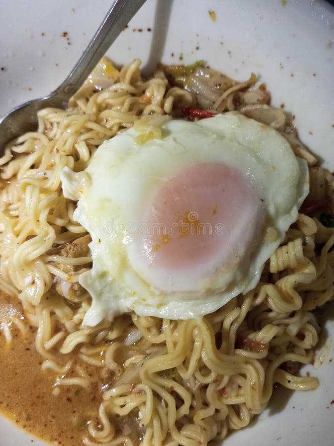 Delicious Boiled Instant Noodles with Additional Topping of Half-boiled ... Delicious Boiled Instant Noodles with Additional Topping of Half-boiled ...