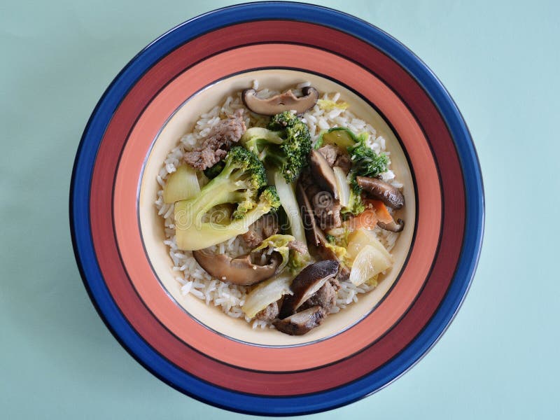 Braised Beef with Mushrooms on a Bed of Jasmine Rice Stock Photo ...