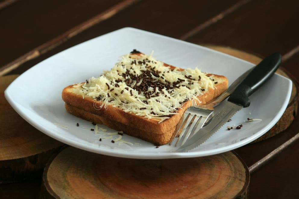 Delicious Bread Sprinkled with Messes and Cheese Stock Image - Image of ...