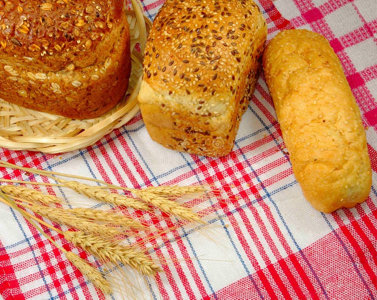 Delicious Bread on the Tablecloth Stock Photo - Image of closeup, baked ...
