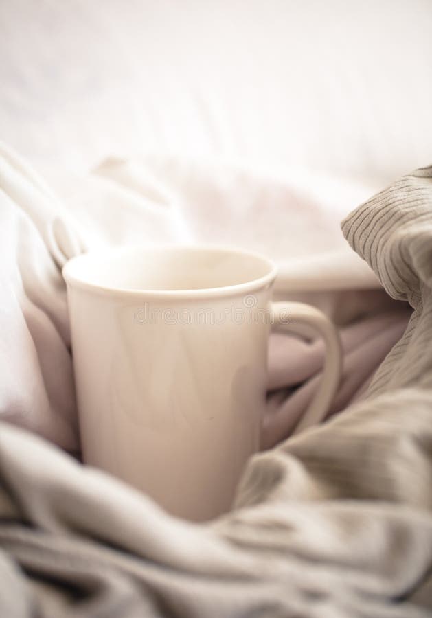 Woman on the bed stock image. Image of cozy, coffee, legwarmers - 51780003