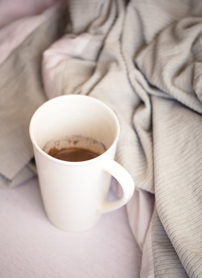 Woman on the bed stock image. Image of cozy, coffee, legwarmers - 51780003