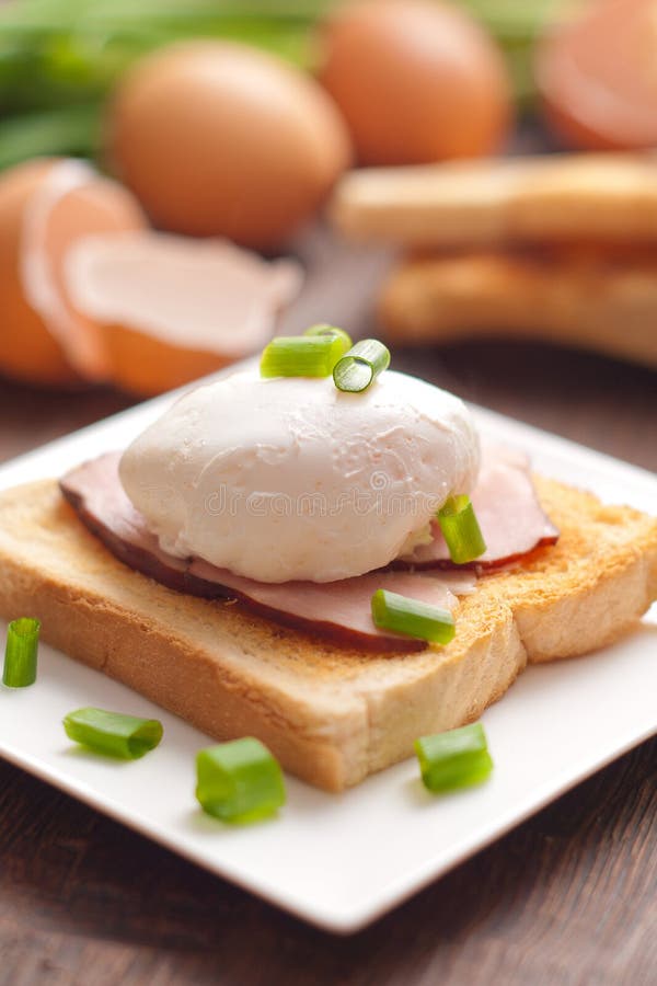 Delicious Breakfast. Eggs Benedict with Ham on Toast. Stock Photo ...