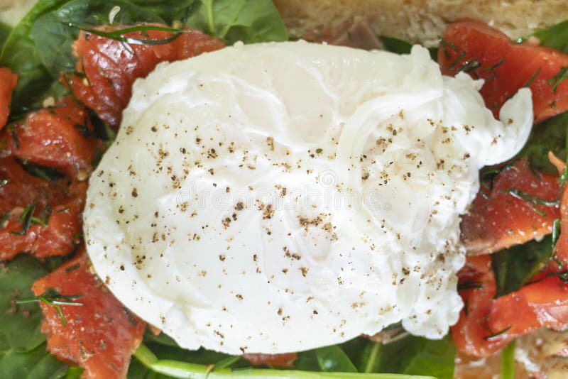 Delicious Breakfast Poached Egg on a Slice of Ciabatta with Spinach and ...