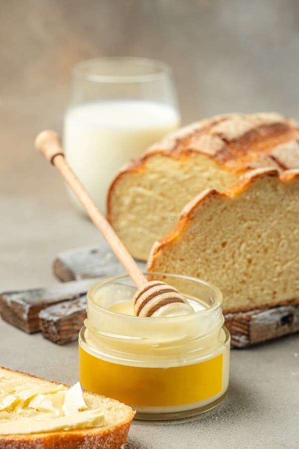 Delicious Breakfast or Snack Bread and Honey, Milk, Vertical Image. Top ...