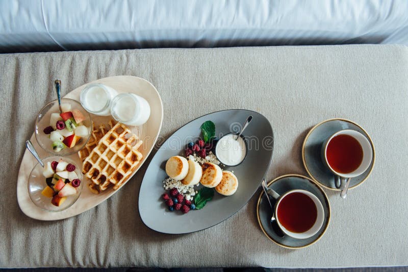 Delicious Breakfast for Two on Bed at the Luxury Hotel Stock Photo ...