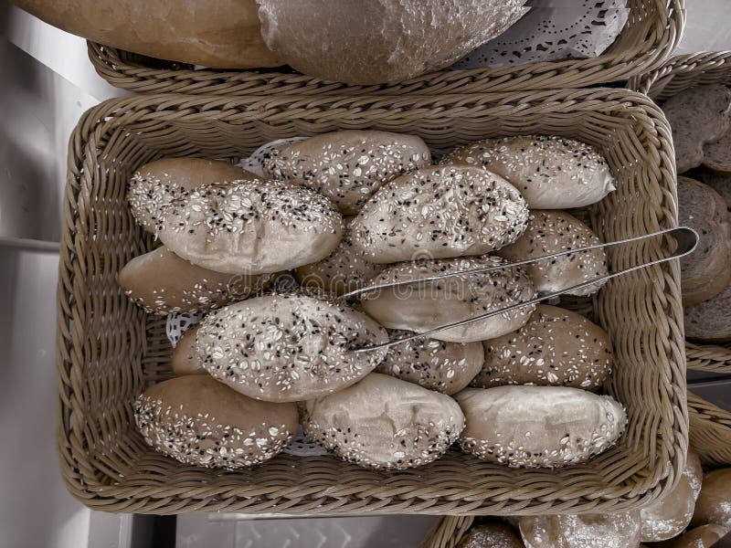 Delicious Buns in a Wicker Basket on the Table. Stock Photo - Image of ...