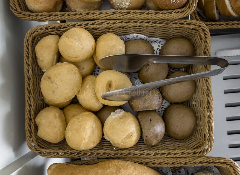 Delicious Buns in a Wicker Basket on the Table. Stock Photo - Image of ...