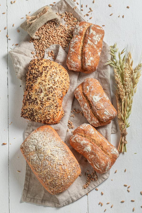 Delicious Buns on Wooden Table Stock Photo - Image of rustic, flour ...