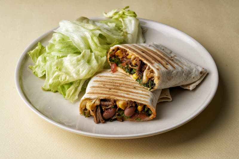 Delicious Burrito on the Plate Stock Photo - Image of delicious, fresh ...