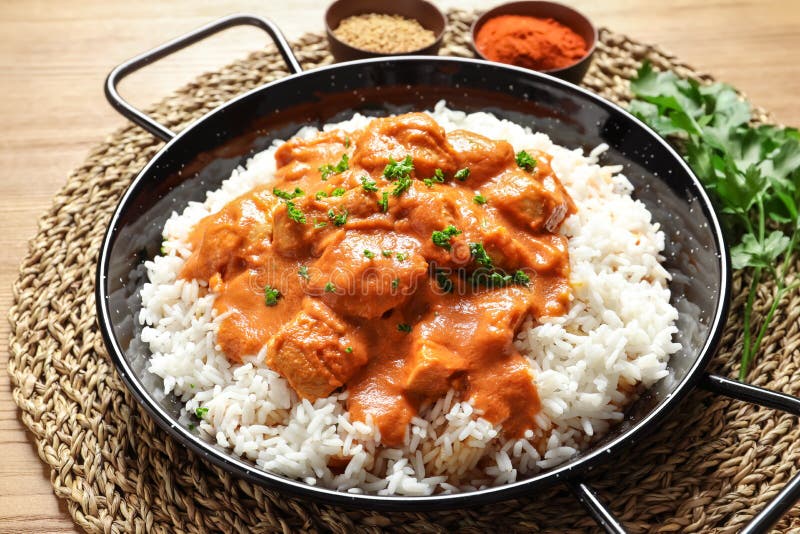 Delicious Butter Chicken with Rice in Dish Stock Photo - Image of ...
