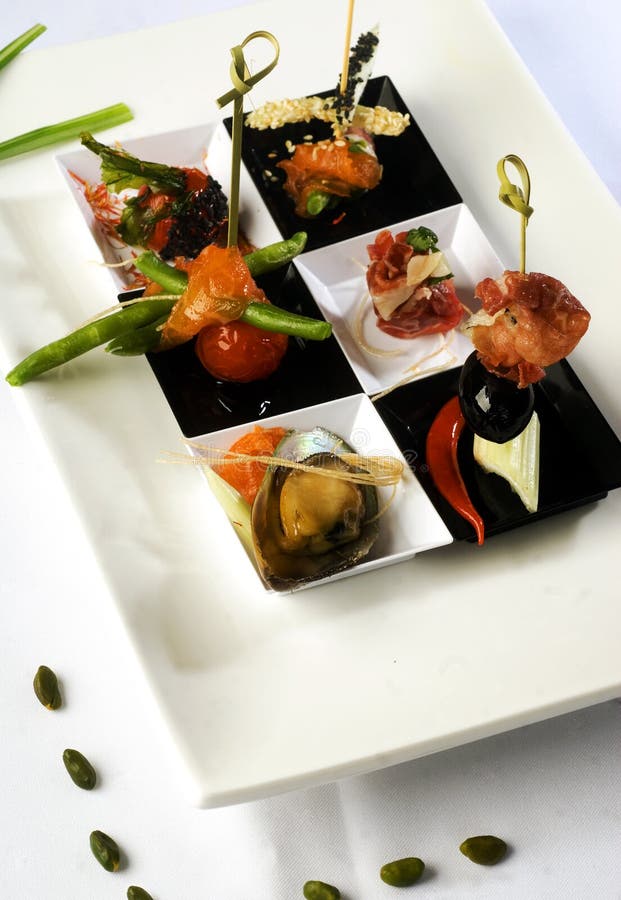 Delicious canapes stock photo. Image of eating, white - 11031272