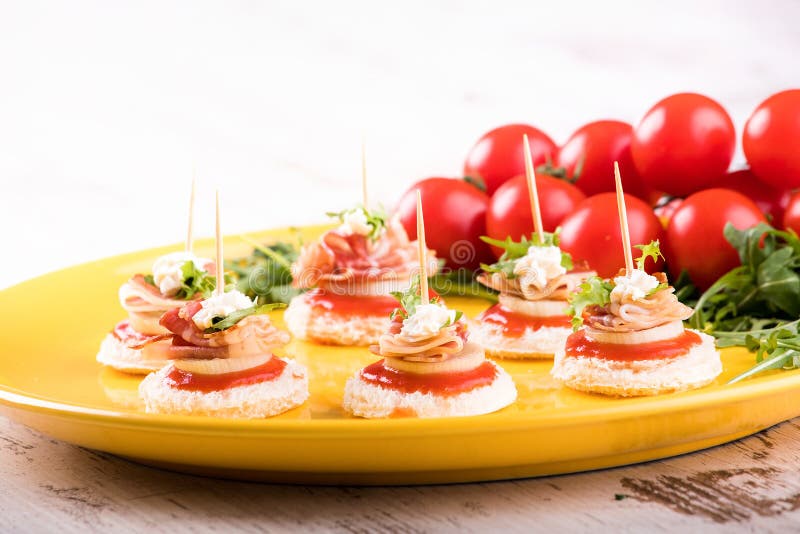 Delicious Canapes with Bacon and Tomato Stock Photo - Image of baguette ...