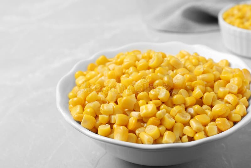 Delicious Canned Corn in Bowl on Marble Table, Closeup Stock Photo ...