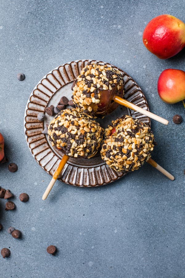 Delicious Carmel Candy Apples with Covered in Chopped Nuts Stock Photo ...