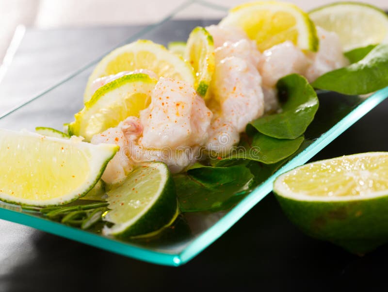 Delicious Ceviche from Cod on a Glass Plate with Lime and Greens Stock ...