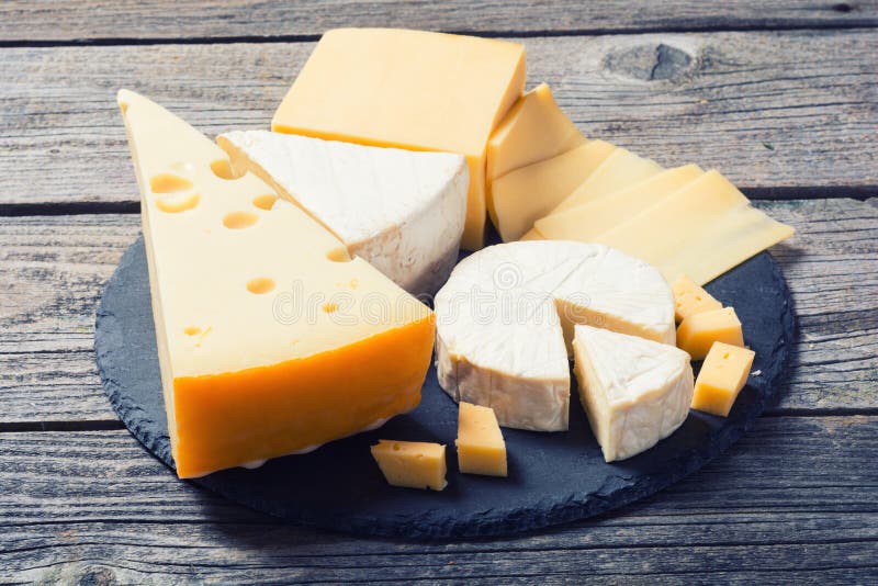 Delicious cheese on table stock image. Image of copy - 88532211