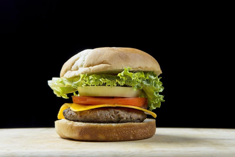 Delicious Cheeseburger and Toppings Stock Photo - Image of burger ...