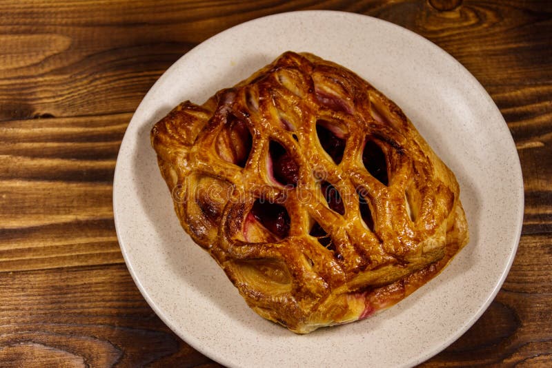 Delicious Cherry Strudel on Wooden Table Stock Photo - Image of ...