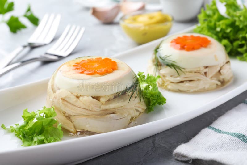 Delicious Chicken Aspic with Eggs and Vegetables on Plate, Closeup ...