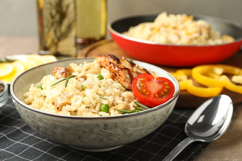 Delicious Chicken Risotto with Tomato on Table, Closeup Stock Image ...