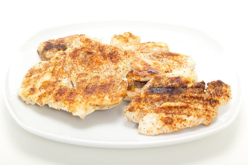 Delicious Chicken on White Plate Stock Photo - Image of broiled, close ...