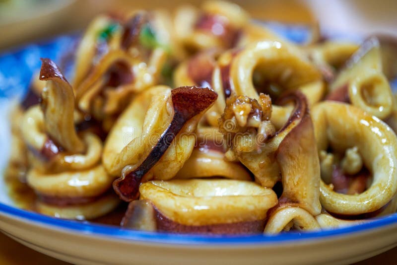A Delicious Chinese Dish with Fried Fresh Squid in Sauce Stock Photo ...