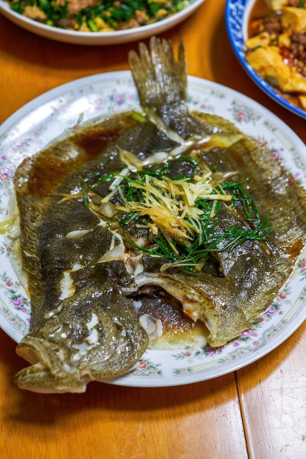 A Delicious Chinese Dish, Steamed Turbot Stock Photo - Image of salad ...