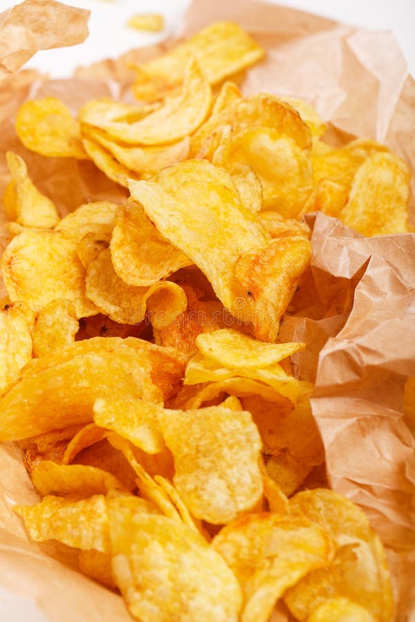 Delicious Chips on the Table Stock Photo - Image of golden, salted ...