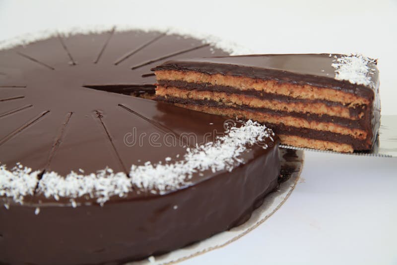 Delicious Chocolate Cake with One Piece Cut from the Whole Cake Stock ...