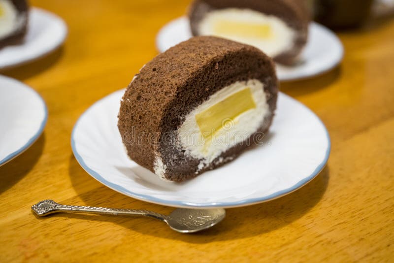 Delicious Chocolate Cake Roll with Cream and Mango Pudding Stock Image ...
