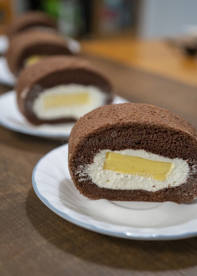 Delicious Chocolate Cake Roll with Cream and Mango Pudding Stock Image ...