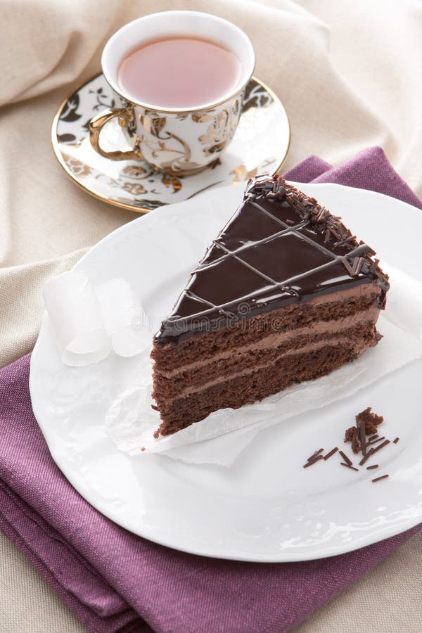 Delicious Chocolate Cake and Tea Stock Image - Image of layered, drink ...