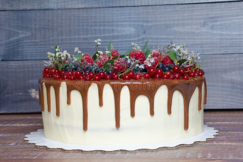 Delicious Chocolate Color Drip Cake with Berries Stock Image - Image of ...