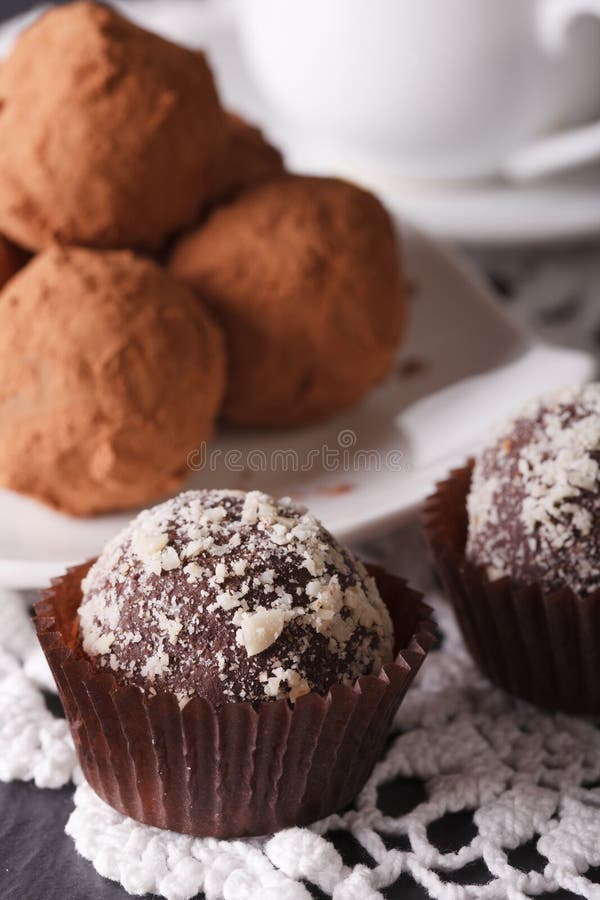 Delicious Chocolate Truffle Candies Macro on a Lace. Vertical Stock ...