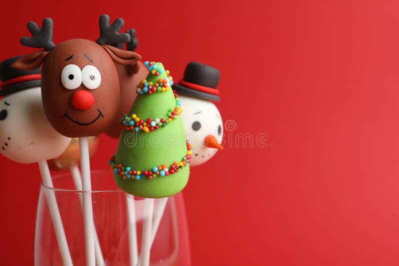 Delicious Christmas Themed Cake Pops on Red Background, Closeup. Space ...
